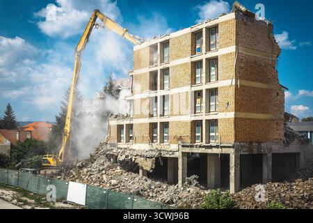 Demolition work ruined excavator with hydraulic crusher comercial ...