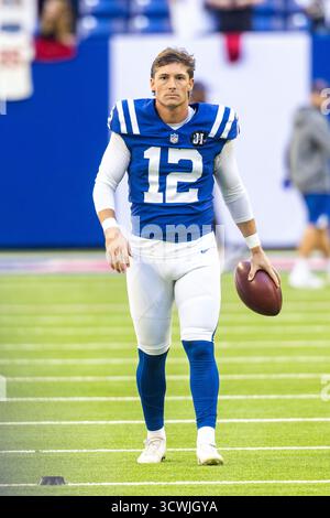 Indianapolis Colts kicker Michael Badgley (12) warms up on the field ...