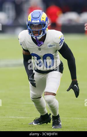 Los Angeles Rams cornerback Josh Wallace (30) wraps up Seattle Seahawks tight end AJ Barner (88 ...