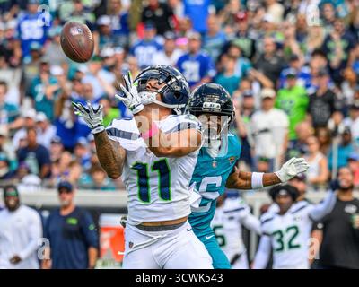 Jacksonville Jaguars cornerback Greg Newsome II (6) and safety Cam'Ron ...