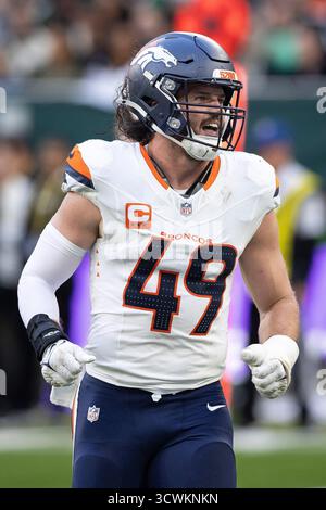 Denver Broncos linebacker Alex Singleton (49) celebrate a play against ...