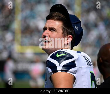 Seattle Seahawks quarterback Drew Lock warms up before an NFL football ...