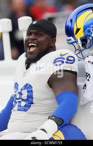 Los Angeles Rams guard Kevin Dotson, center Coleman Shelton (65) and ...