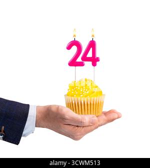 Hand handing a birthday cupcake - Pink candle, number 148 on a white ...