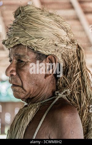 Indigenous Yagua Chief in traditional clothing in Iquitos, Peru Stock ...