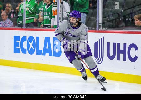 St. Thomas defenseman Bauer Berry skates to the puck against Minnesota ...