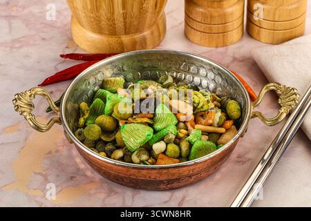Japanese snack - Wasabi endo arare rice cruncy cracker Stock Photo - Alamy