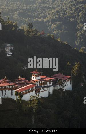 Majestic architectural building with green roofs against a bright blue ...