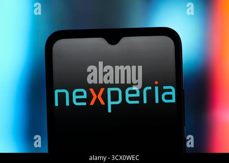 In this photo illustration, a Nexperia logo is displayed on a ...