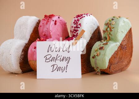 World baking day greeting card Delicious fresh croissant topped with ...