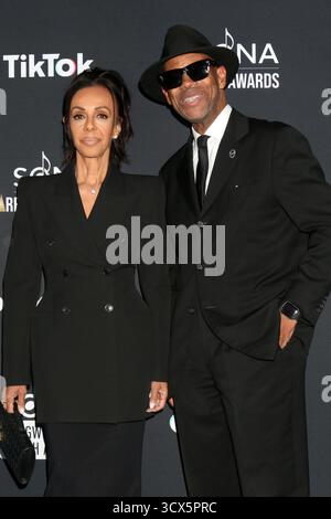 Lisa Harris, left, and Jimmy Jam arrive at the 68th annual Grammy ...