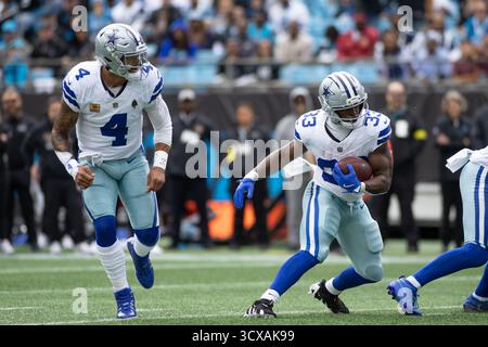 Dallas Cowboys running back Javonte Williams (33) runs the ball as ...