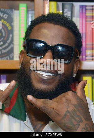 Miami, Florida, USA. 13th Oct, 2025. Rapper/author Gucci Mane sign ...