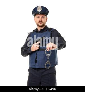 Uniform of policeman with gun and handcuffs on table Stock Photo - Alamy