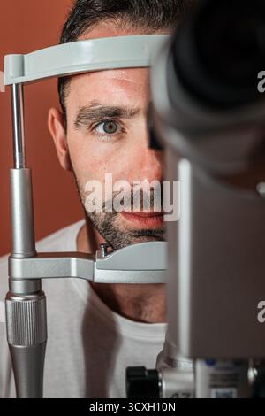 Professional ophthalmologist conducts eye treatment with medicine Stock ...