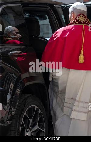 Pope Leo XIV leaves at the end of his weekly general audience in St ...