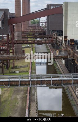 Zollverein coking plant, coke ovens, chimneys and belt bridges are ...