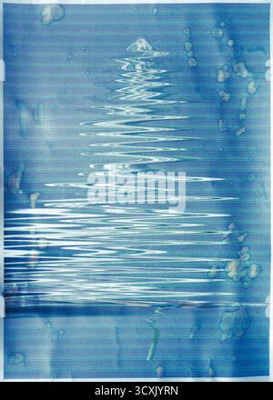 christmas tree made from ribbon on a green background Stock Photo - Alamy