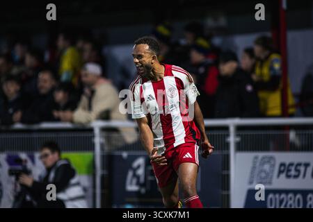 Brackley, UK. 14th Oct, 2025. Zak Lilly (19 Brackley Town) looks on ...