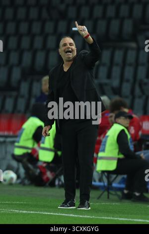 Israel coach Ran Ben Simon attends a news conference ahead of Tuesday's ...