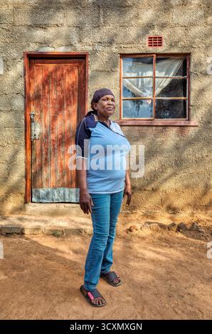 Single young African mother in a village in Botswana, the drama of ...