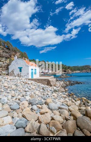 Vertical shot of the beach under a clear blue sky Stock Photo - Alamy