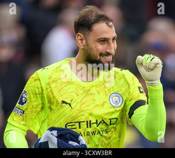 Manchester City's goalkeeper Gianluigi Donnarumma sits on the ground as ...