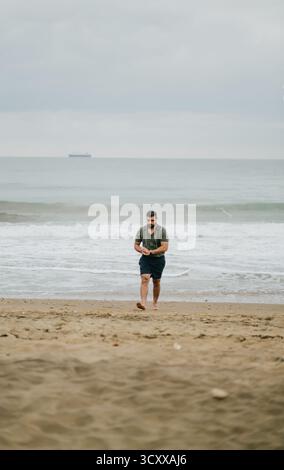 A vertical shot of a beautiful sunset on Shem creek with a cloudy sky ...