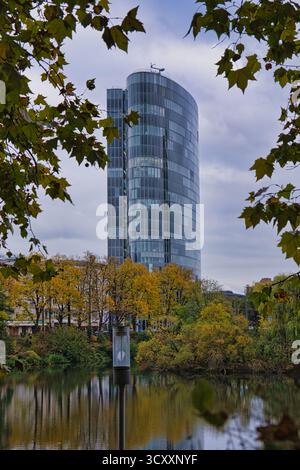 Calm lake surrounded by autumn trees and mountains Stock Photo - Alamy