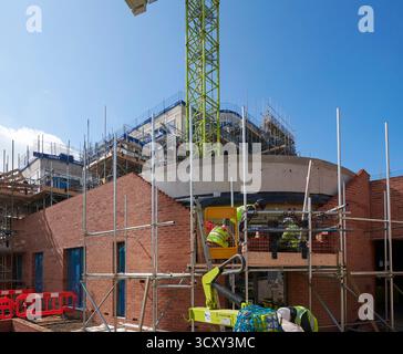 BUILDERS WORKING ON NEW HOMES IN CAMBRIDGE Stock Photo - Alamy