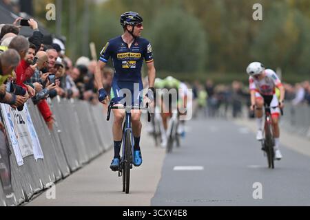 Belgian Toon Aerts celebrates as he crosses the finish line to win the ...