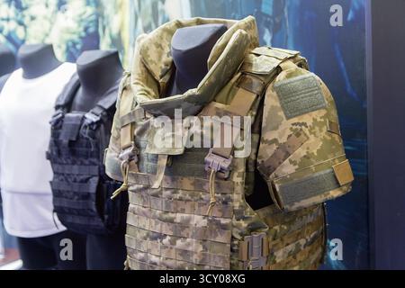 Mannequin dressed in camouflage attire and tactical gear on display in ...