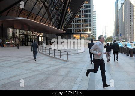 People walk outside of the JPMorgan Chase global headquarters building ...