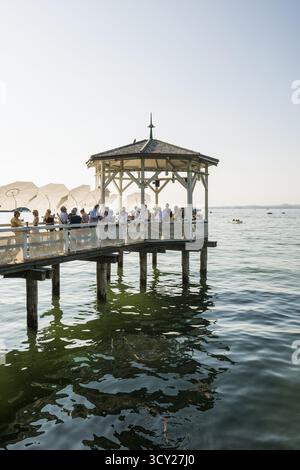 Lake pavilion with bar on the promenade, sunset, Bregenz, Lake ...