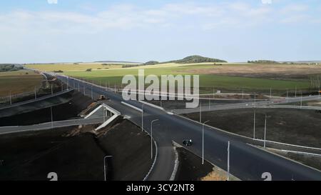 Highway interchange construction progressing over time. Clip Stock ...