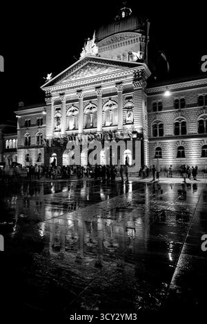 A beautiful view of the Bundesplatz in Bern overlooking a park with ...