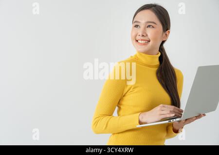 Positive freelance employee girl in headphones speaking on video call ...