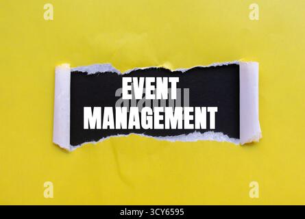 Torn yellow paper on black background Stock Photo - Alamy