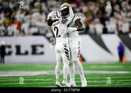Cincinnati Bengals place kicker Evan McPherson (2), right, and punter ...