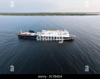 Aerial drone view of Ro-Pax cargo passenger ferry ship transporting ...