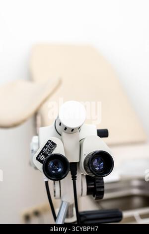 Close up colposcope on the background of ultrasound machine in ...