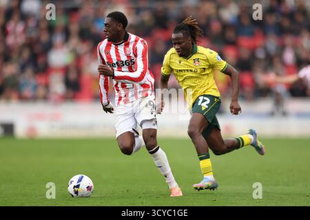 Stoke City's Divin Mubama (left) celebrates scoring their side's second ...