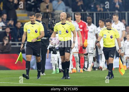 Referee Anthony Taylor leads both teams out during the Premier League match Manchester United vs ...