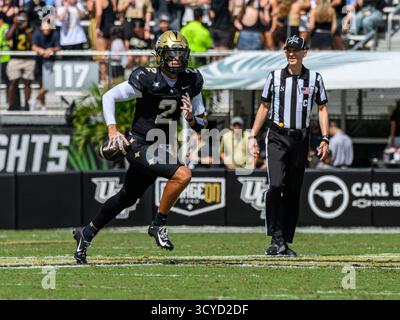 Central Florida quarterback Tayven Jackson (2) looks to throw a pass ...