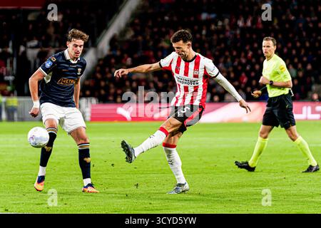 Ivan Perisic of PSV Eindhoven passes the ball under pressure from ...