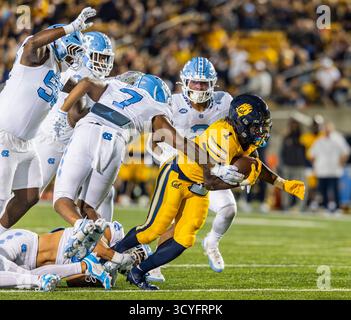 California running back Kendrick Raphael (1) is tackled by SMU ...