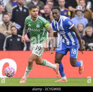 Newcastle United's Bruno Guimaraes (left) and Manchester City's Phil ...