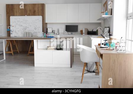 Interior of light medical laboratory with tables and houseplants Stock ...