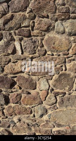 View of Rustic stone wall with irregular shapes Stock Photo - Alamy