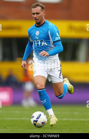 Stockport, UK. 18th Oct, 2025. Reece Cole and teammates of Exeter City ...